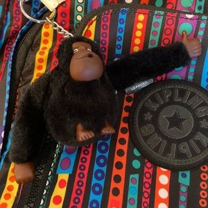 Kipling | Bags | Nwot Kipling Multi Colored Circlesstripe Backpack ...